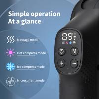 China Professional Wholesale Portable Massage Therapy Gun With Hot Function For Relax for sale