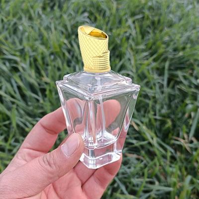 China Custom 55ml Glass Perfume Bottle with Zamac Cap for OEM Perfume Packaging for sale