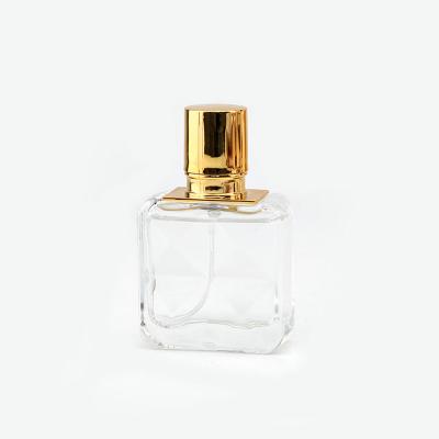 China 30ml Square Glass Perfume Bottle Transparent Portable Spray Bottle with Gold Cap for sale
