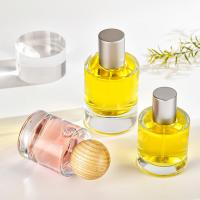 China Perfume Glass Bottle 50ml Bayonet Cylinder Transparent Spray Bottle with Wooden Cover for sale