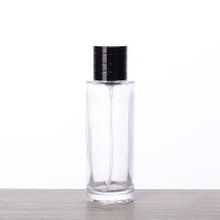 China 50ml Tall Cylindrical Glass Perfume Bottle Fine Spray Portable Cosmetics Bottle with Cap for sale