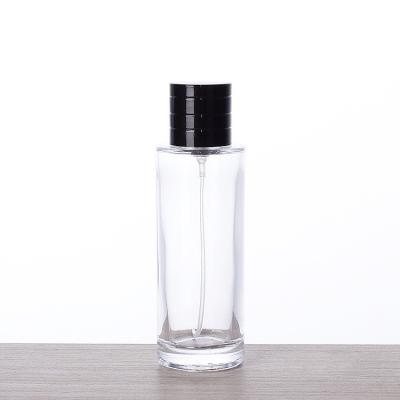 China 50ml Tall Cylindrical Glass Perfume Bottle Fine Spray Portable Cosmetics Bottle with Cap for sale