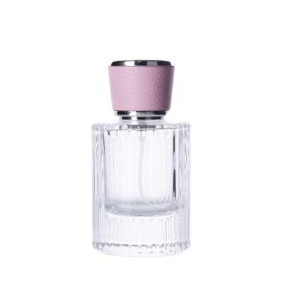 China 50ml Vertical Stripe Glass Perfume Bottle with Bayonet Spray and Cap for OEM for sale