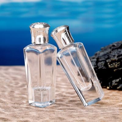 China 50ml Diamond Shaped Glass Perfume Bottle with Thick Bottom and Carved Cover for Cosmetics for sale