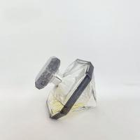China Diamond Shaped Glass Perfume Bottle 75ml 100ml with Zamak Cap Empty Spray Bottle for Cosmetics Packaging for sale