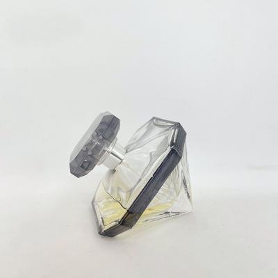 China Diamond Shaped Glass Perfume Bottle 75ml 100ml with Zamak Cap Empty Spray Bottle for Cosmetics Packaging for sale