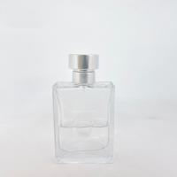 China 100ml Glass Perfume Bottle with Zamak Cap OEM Custom Logo B2B Wholesale for sale