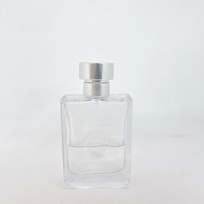 China 100ml Glass Perfume Bottle with Zamak Cap OEM Custom Logo B2B Wholesale for sale