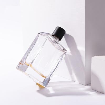 China 100ml Square Glass Perfume Bottle Empty Spray Bottle with Zamak Plastic Cap Portable Cosmetics Bottle for sale