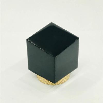 China Custom Zinc Alloy Perfume Bottle Cap Die Casting 24mm 30mm Black Gold Silver for sale