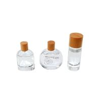 China Natural Solid Wood Cylinder Perfume Bottle Cap - Custom Sizes & Logo Printing - Eco-Friendly Material for sale