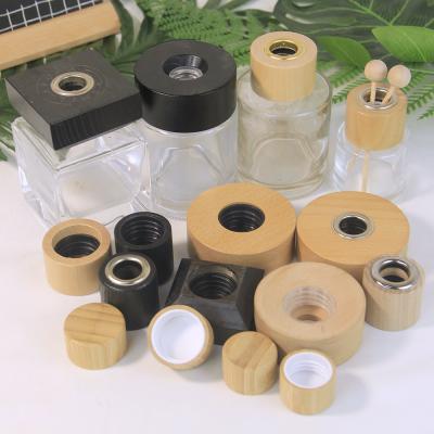 China Natural Solid Wood Fragrance Bottle Caps - Custom Sizes with Silk Screen Printing for Perfume Packaging for sale