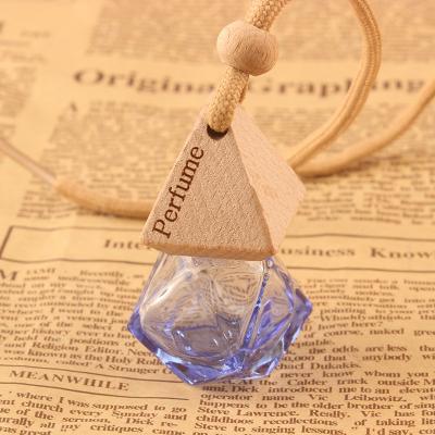 China 8ML Triangular Cap Rhombic Empty Glass Bottle with Custom Wooden Cap for Car Fragrance and Perfume Applications for sale