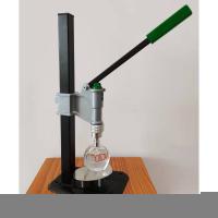 China Manual Perfume Bottle Capper Machine for 13mm/15mm Plastic Bayonet Caps - 1.78kg Weight, 200x180x460mm for sale
