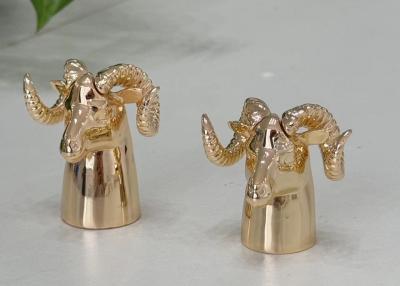 China Elegant Antelope-Shaped Zamak Perfume Caps Perfume Cover With Customized Logo for sale