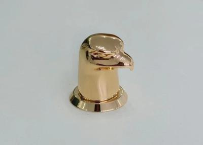 China Zinc Alloy Eagle-Shaped Metal Perfume Bottle Caps for Skin Care with Custom Logo 24mm for sale