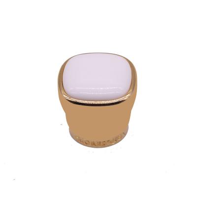 China Custom Gold Zinc Alloy Perfume Bottle Caps 500pcs MOQ with CNC Laser Engraved Logo for sale