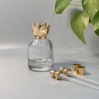 China Custom Flower Shaped Zinc Alloy Perfume Cap 18mm for Elegant Fragrance Packaging with Custom Logo for sale