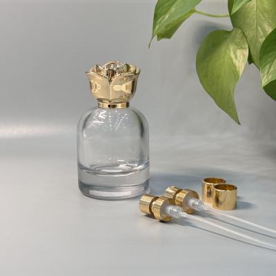 China Custom Flower Shaped Zinc Alloy Perfume Cap 18mm for Elegant Fragrance Packaging with Custom Logo for sale