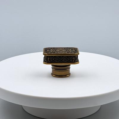 China Custom T-Shaped Zamak Perfume Caps 20mm Eco-Friendly Zinc Alloy Bottle Caps for sale