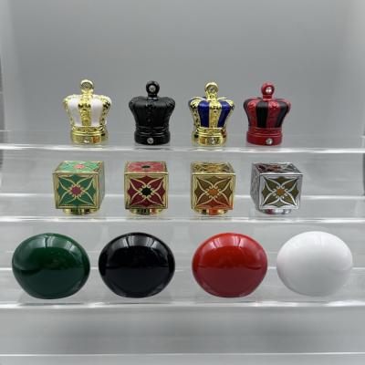 China Black Gold Crown Shaped Diamond Zamak Perfume Caps for Standard Bottle Necks 20mm for sale