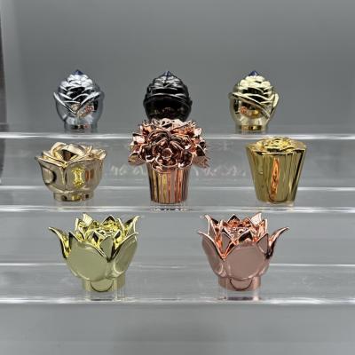 China Exquisite Flower Shaped Crystal Zamak Perfume Caps for Standard 15mm Bottle Necks for sale