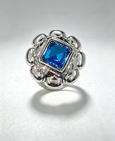 China Luxury Zamak Perfume Cap with Brilliant Blue Gemstone 20mm Premium Bottle Closure for sale