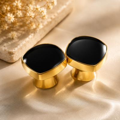 China Luxury Geometric Black Crystal Zinc Alloy Perfume Bottle Cap Electroplated Gold Finish 24mm for sale