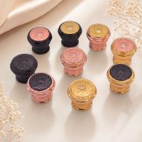 China Custom Zamak Perfume Cap 24mm Two-Tone Gold Rose Gold Embossed Design High Corrosion Resistance for sale