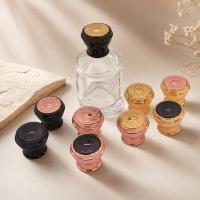 China Custom Zamak Perfume Cap 24mm Two-Tone Gold Rose Gold Embossed Design High Corrosion Resistance for sale