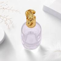 China Customized Golden Textured Zamak Perfume Cap 24mm Elegant Zinc Alloy Bottle Lid for sale