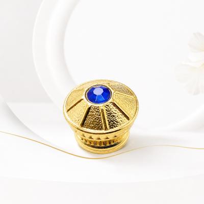 China Zinc Alloy Perfume Spray Top 18mm Custom Size Gold Plated Faceted Blue Gem Luxury Fragrance Cap for sale