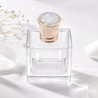 China Customized Design Eco-Friendly Lightweight Zamak Perfume Bottle Cap with Stone Accent for sale