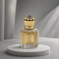 China Wholesale High Gloss Gold Ribbed Bud Shape Perfume Bottle Cap With Blue Rhinestone Top Heavy Zamac Closure OEM Custom Engrave Logo Middle East Luxury Oud Fragrance Packaging for sale
