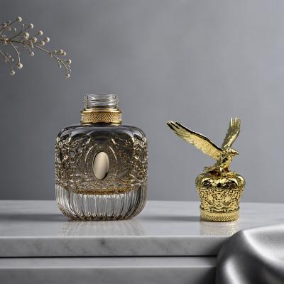 China Luxury 3D Spread Wings Eagle Zamac Perfume Cap Gold Plated Embossed Royal Crown Base Animal Sculpture Fragrance Lid Zinc Alloy Metal Parfum Bottle Cover Custom Logo FEA15 For Perfume Bottle for sale