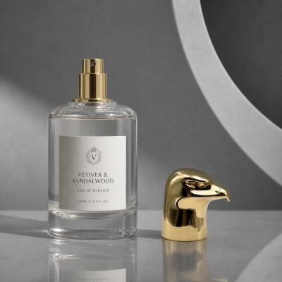 China Wholesale High Polished Gloss Gold Integrated Eagle Head Perfume Bottle Cap Plain Smooth Hawk Sculpture Zamac Closure OEM Custom Engrave Logo Middle East Luxury Fragrance Packaging for sale