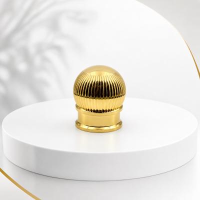 China Wholesale High Gloss Gold Vertical Line Pumpkin Ball Perfume Bottle Cap With Double Tier Base Ribbed Spherical Zamac Closure OEM Custom Engrave Logo Middle East Luxury Fragrance Packaging for sale
