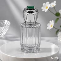 China Factory Custom Logo Mirror Silver Wavy Tiered Zamac Perfume Cap Gloss Zinc Alloy Wave Layer Lid With Square Emerald Crystal Compatible FEA15 50ml Vertical Rib Glass Perfume Bottles for sale