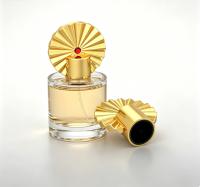 China Luxury Fan Shaped Zamac Perfume Cap with Inlaid Red Crystal Gold Plated Fragrance Bottle Lid for sale