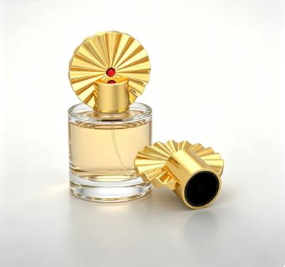 China Luxury Fan Shaped Zamac Perfume Cap with Inlaid Red Crystal Gold Plated Fragrance Bottle Lid for sale