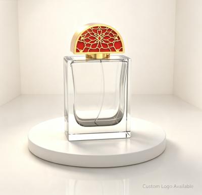 China Semicircle Hollow Floral Zamac Perfume Cap with Red Enamel Gold Plated Finish and Custom Logo Engraving for sale