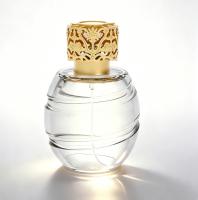 China Luxury Hollow Floral Zamac Perfume Cap Gold Plated Bottle Lid for sale