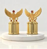 China Magnetic Eagle Wing Perfume Cap with Red Rhinestone Gold Plated Bottle Lid for sale