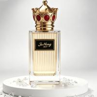 China Magnetic Crown Shape Zamac Perfume Cap with Inlaid Red Rhinestone and Customizable Design for sale