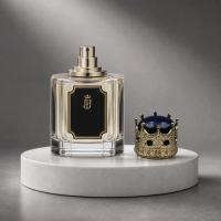 China Crown Embossed Zamac Zinc Alloy Perfume Cap with Resin Top and Customizable Design for sale
