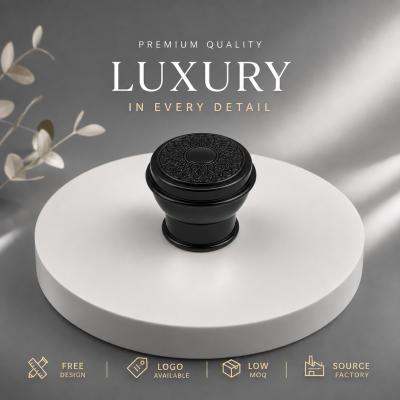 China Source Factory Custom Embossed Zinc Alloy Perfume Cap Black Gloss Relief Floral Metal Perfume Lid Low MOQ Custom Logo Printing Service for sale