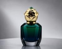 China Golden Embossed Pine Cone Shape Perfume Cap Zinc Alloy Fragrance Bottle Top With Emerald Rhinestone Custom Luxury Perfume Packaging Accessory Magnetic for sale