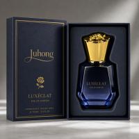 China Golden Embossed Pine Cone Shape Perfume Cap Zinc Alloy Fragrance Bottle Top With Emerald Rhinestone Custom Luxury Perfume Packaging Accessory Magnetic for sale