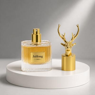 China Luxury 3D Deer Head Zamac Perfume Cap with Custom Logo Engraving and Electroplated Gold Finish for sale