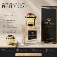 China Luxury Crown Shape Zinc Alloy Perfume Cap Inlaid Red Rhinestone Custom Logo Gold Plated Zamac Metal Perfume Bottle Lid OEM High-End Fragrance Bottle Cover Magnetic for sale
